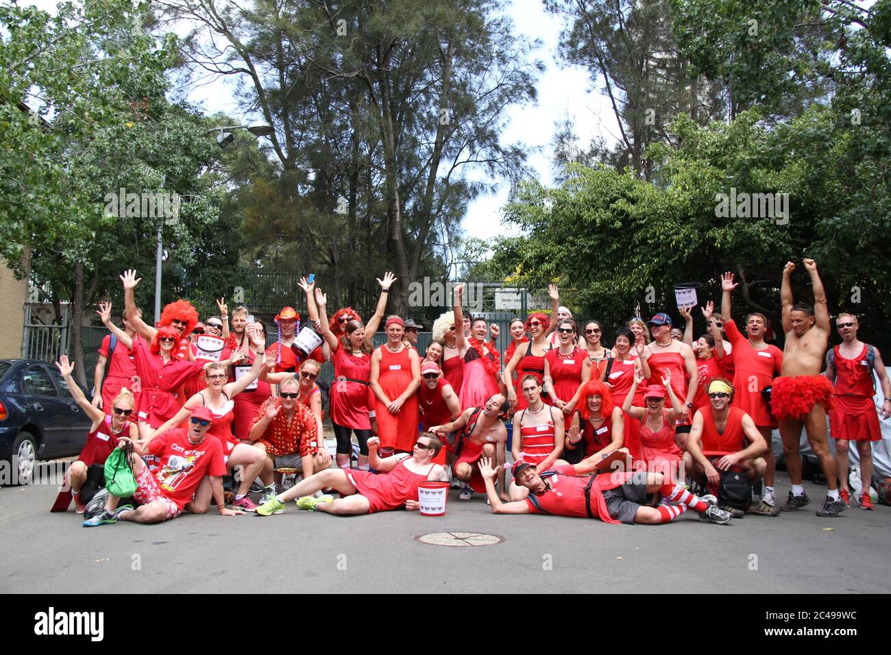Group photo of the Sydney Thirsty Hash House Harriers 2014 red dress ...