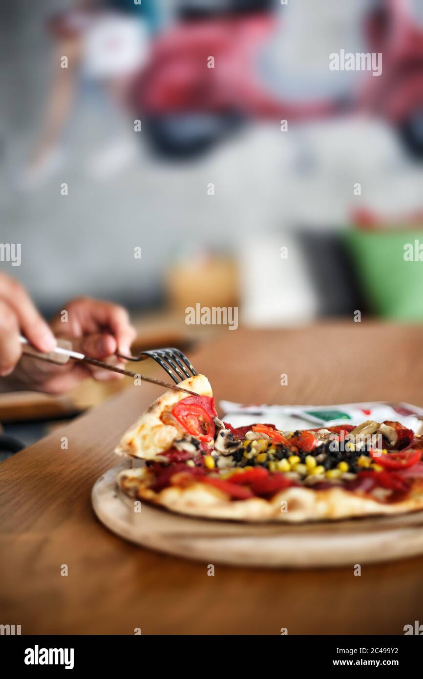 Pizza on wooden table. For fast food restaurant design or fast food ...