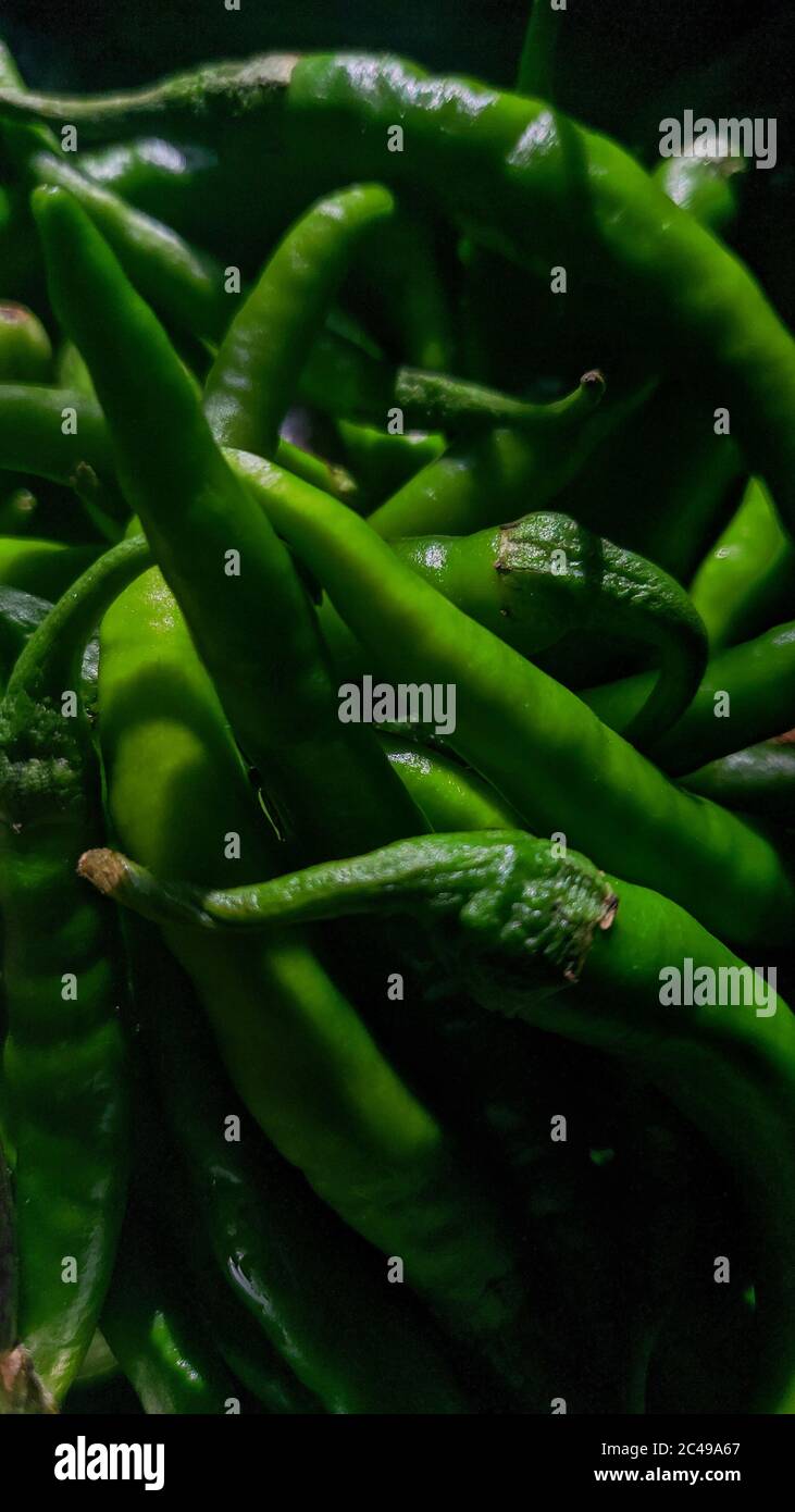 Detail of fresh green chillies hi-res stock photography and images - Alamy
