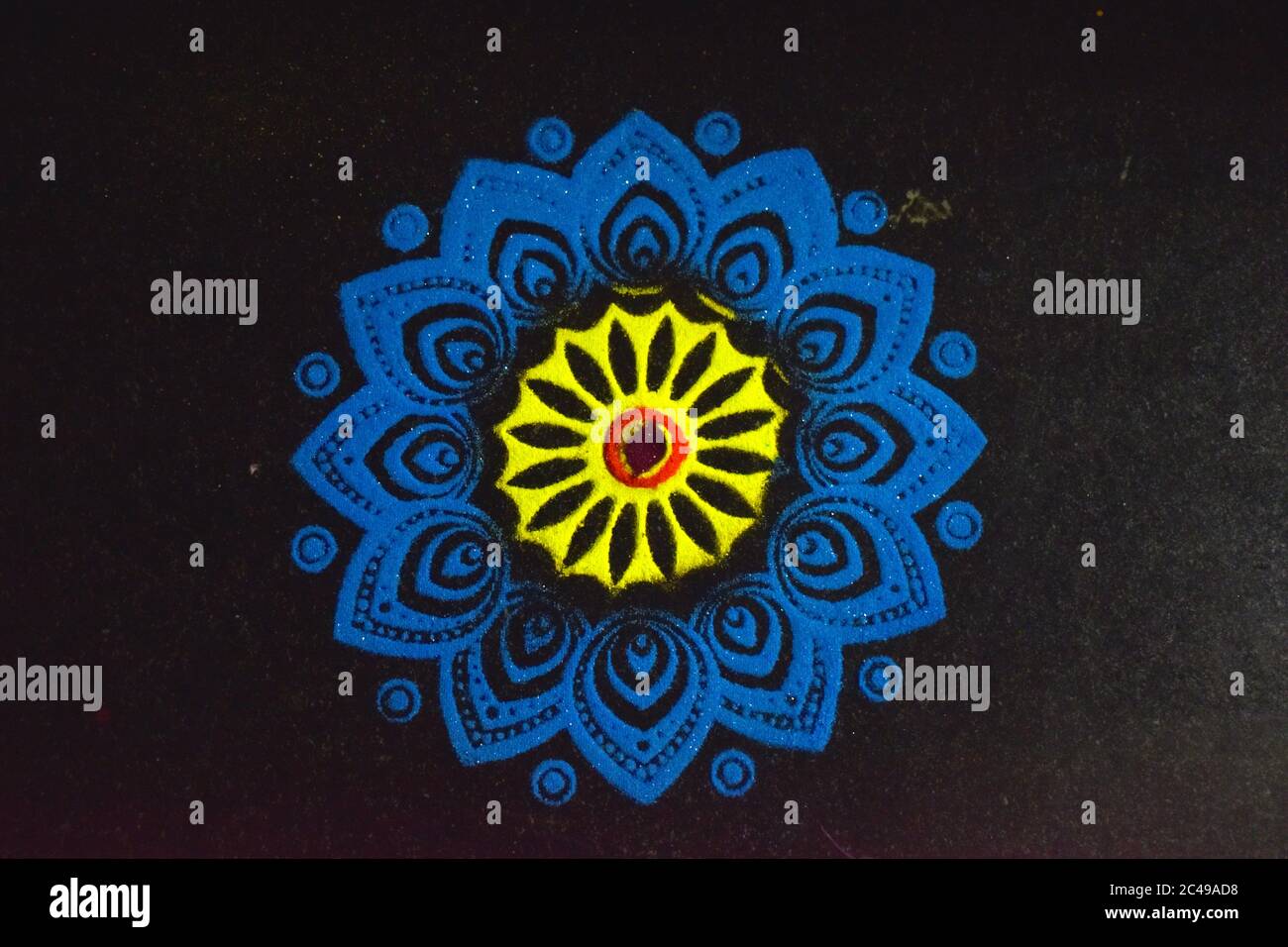 A closeup view of colorful rangoli in india, in the celebration of ...