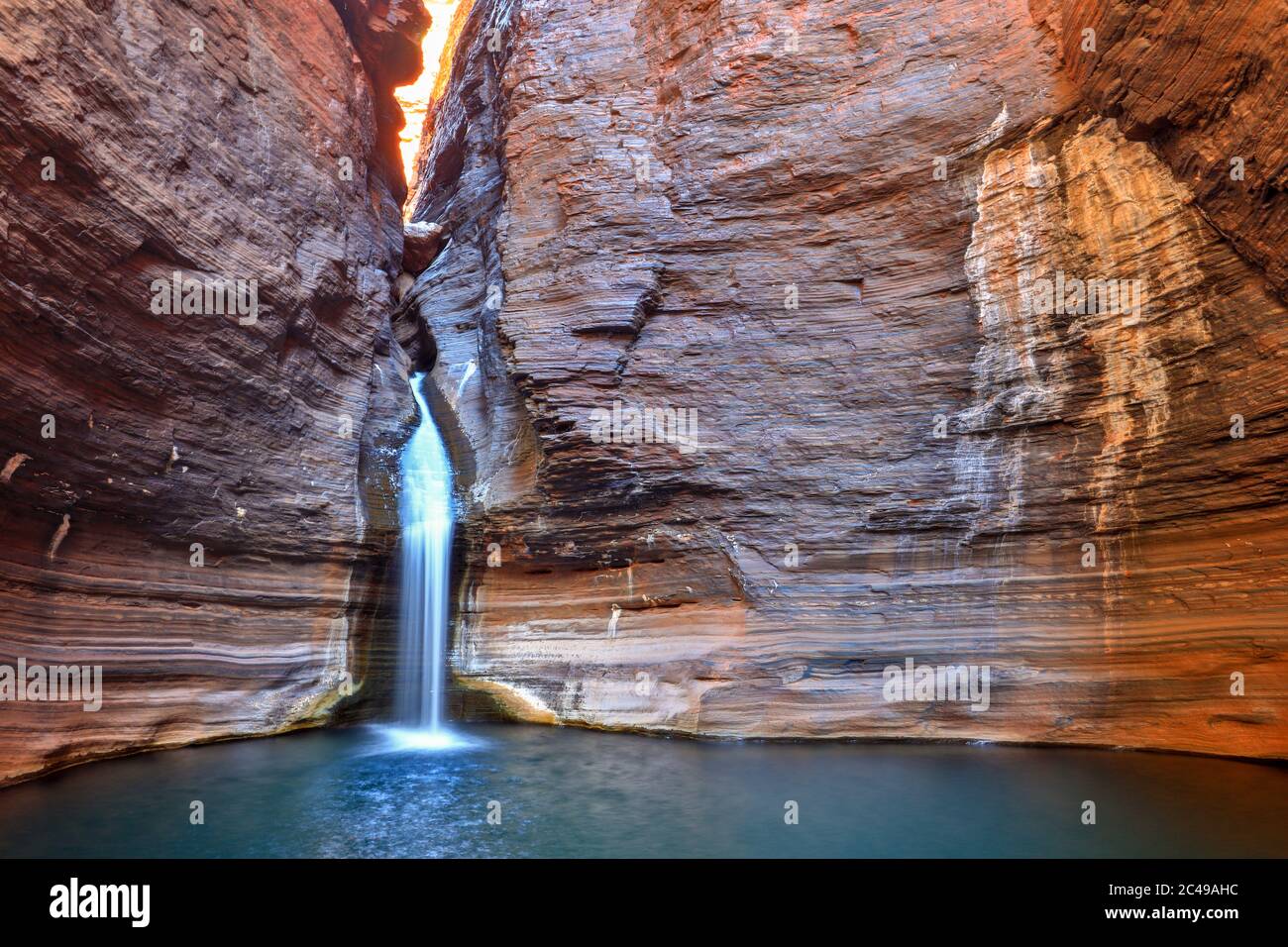 waterfall inside a gorge in karijini in the pilbara region of western ...