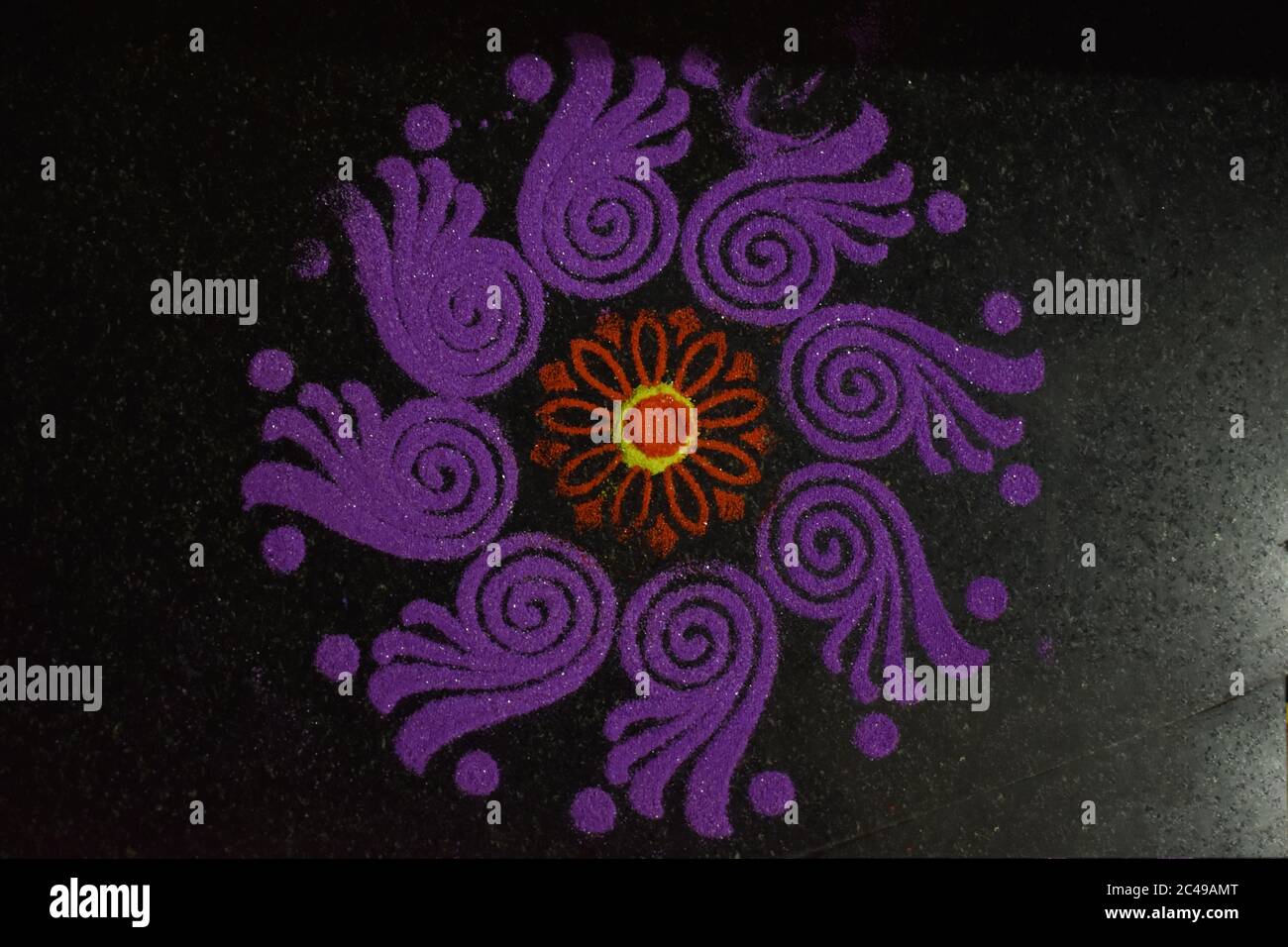 A closeup view of colorful rangoli in india, in the celebration of ...