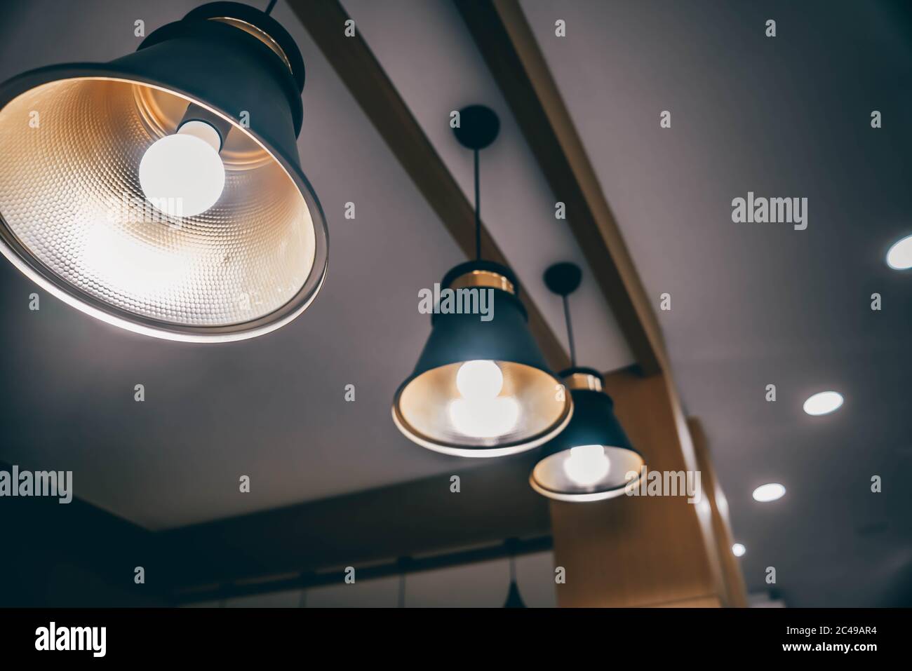 Hanging lamp with a beautiful cover on the ceiling Stock Photo - Alamy