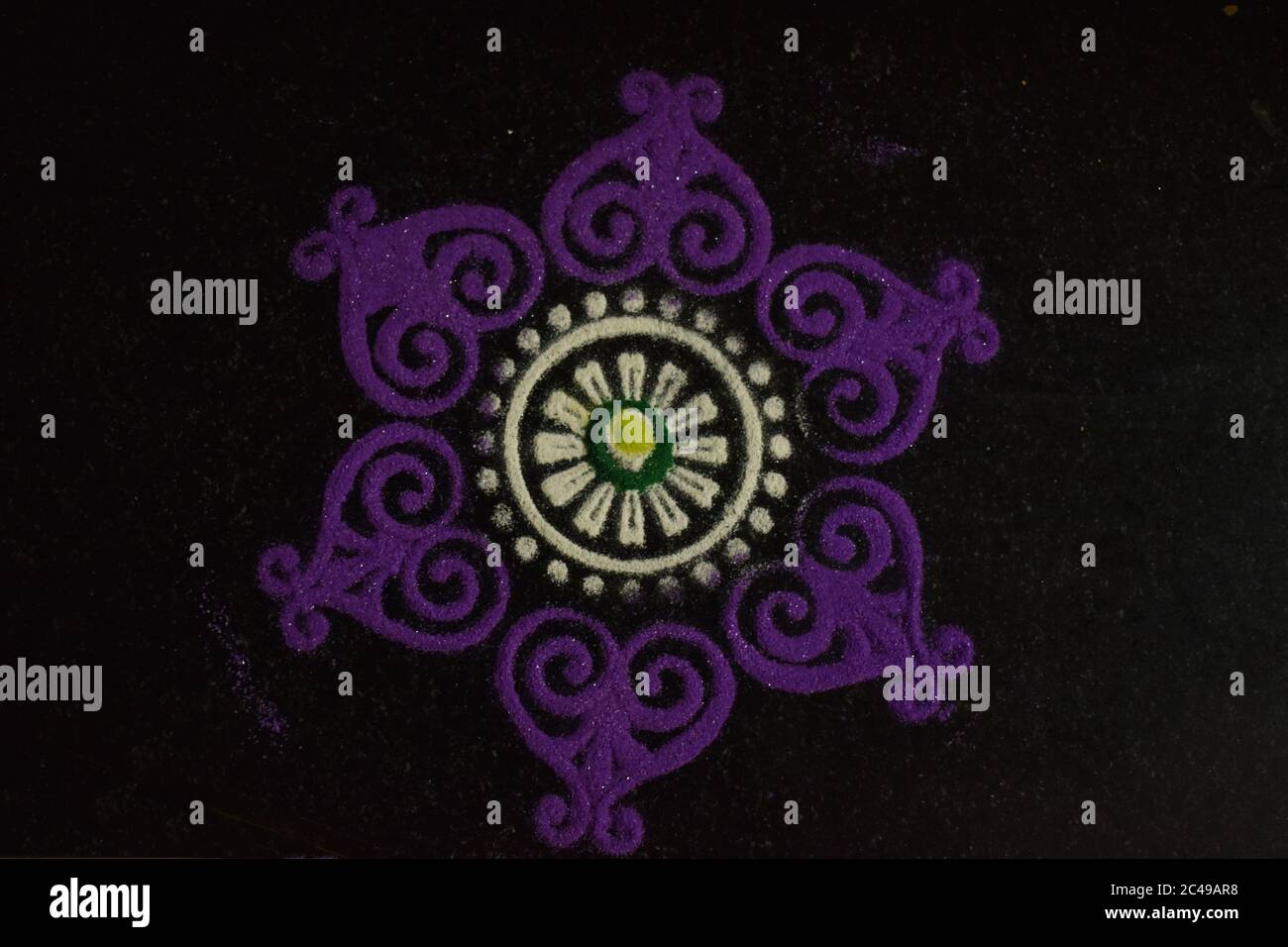 A closeup view of colorful rangoli in india, in the celebration of ...