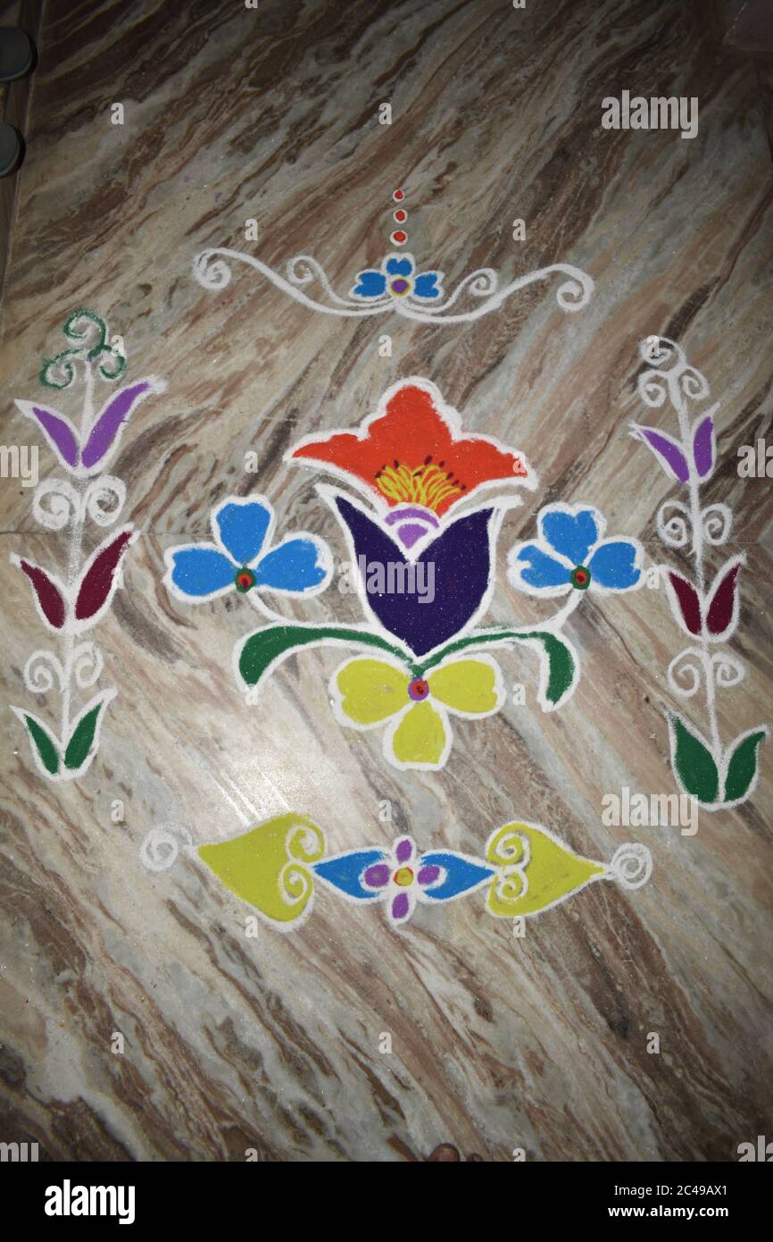 A closeup view of colorful rangoli in india, in the celebration of ...