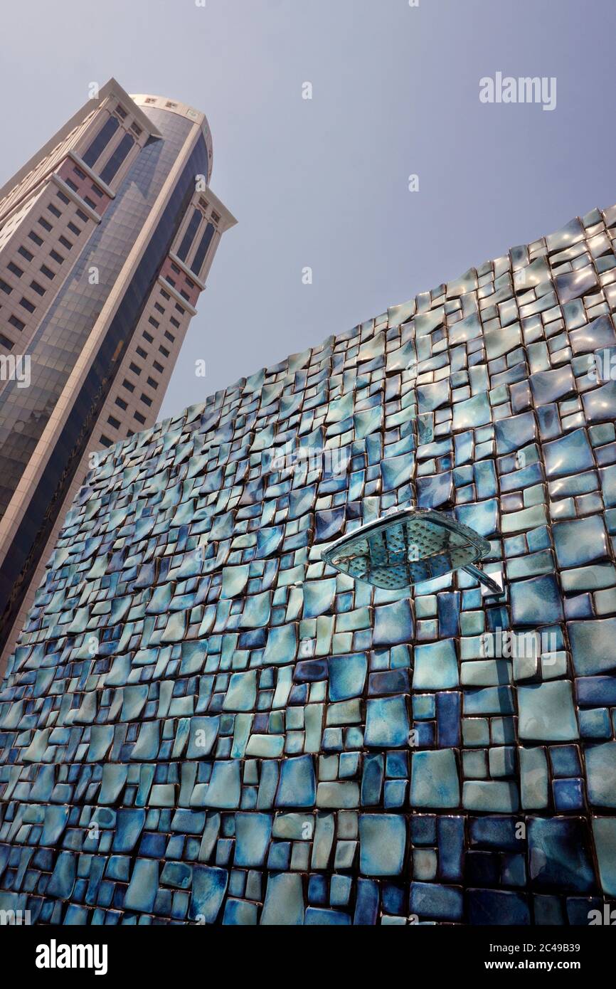 ornate ceramic wall and architecture surrounding swimming pool Doha ...