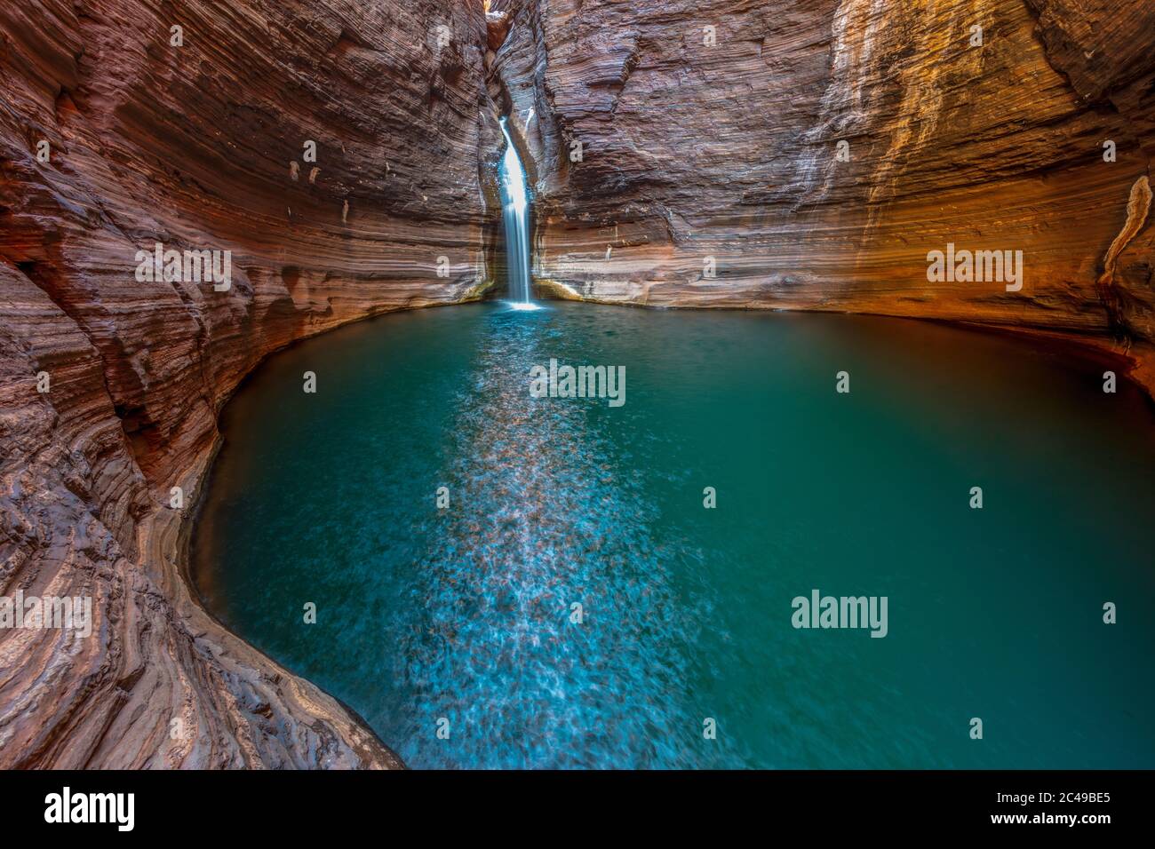 waterfall inside a gorge in karijini in the pilbara region of western ...