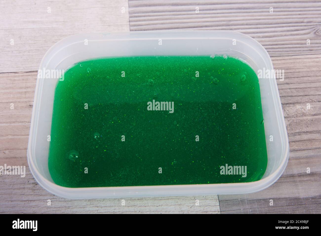 Green slime in plastic hi-res stock photography and images - Alamy