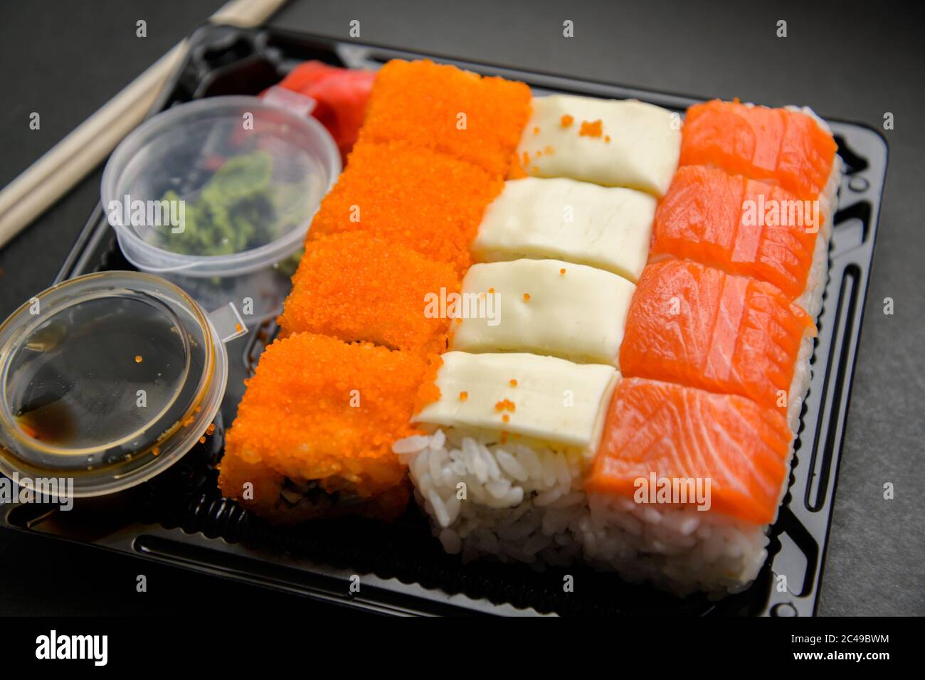 Set of various rolls in black plastic box Stock Photo - Alamy