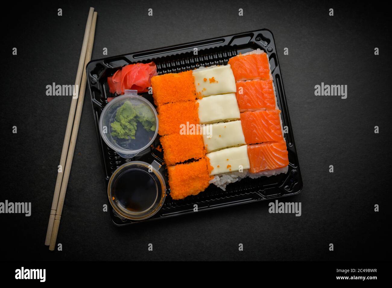 Set of various rolls in black plastic box Stock Photo - Alamy