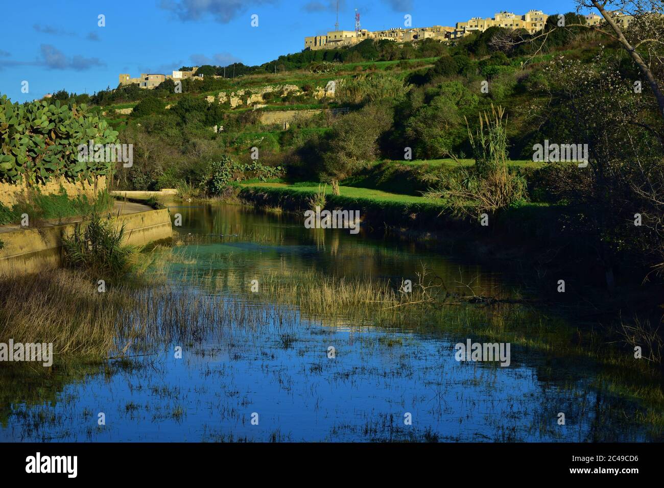 MTARFA, MALTA - Dec 11, 2014: Man made reservoir of rain water, held by ...