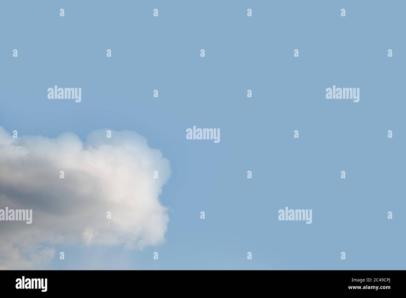 One white cloud on clear blue sky background Stock Photo - Alamy