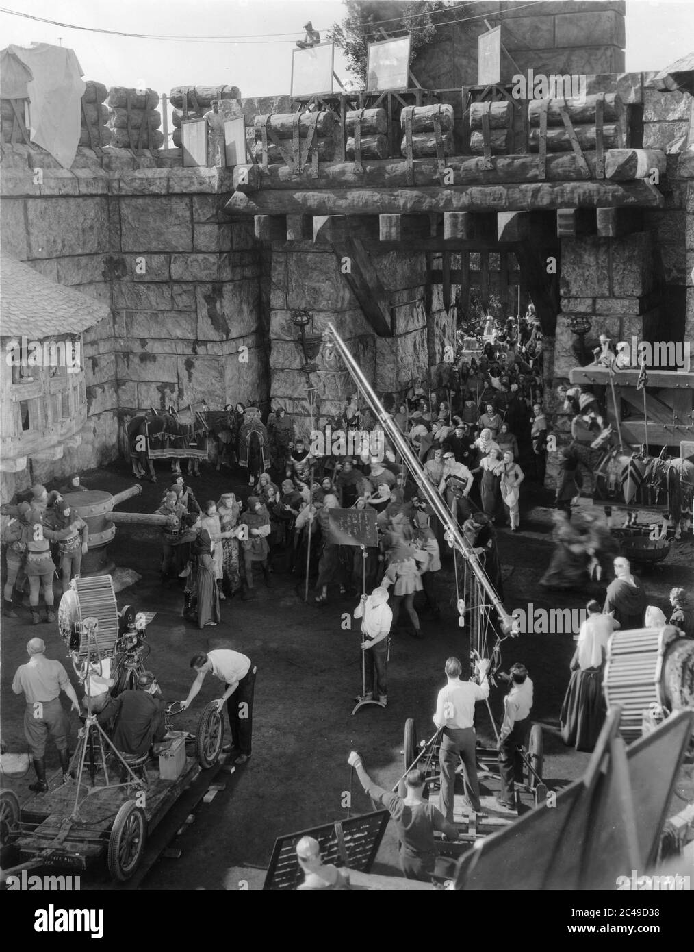 Director CECIL B. DeMILLE directing C. AUBREY SMITH and movie extras in ...