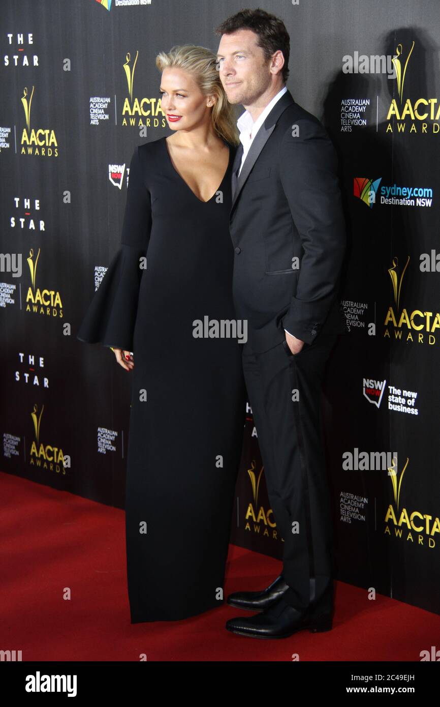 Lara Bingle and Sam Worthington arrive on the red carpet for the 3rd ...
