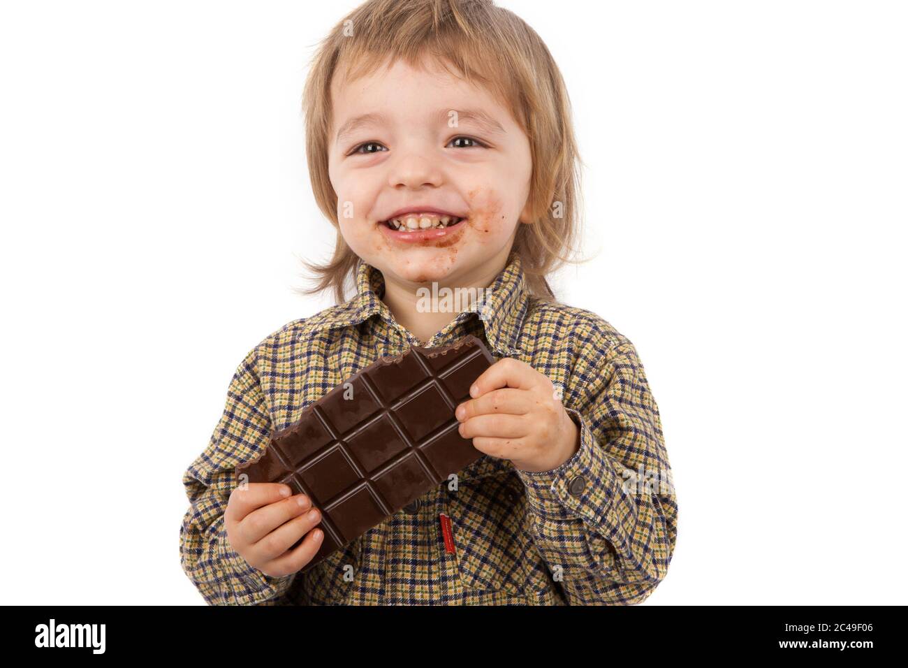 Boy eating bar chocolate hi-res stock photography and images - Alamy