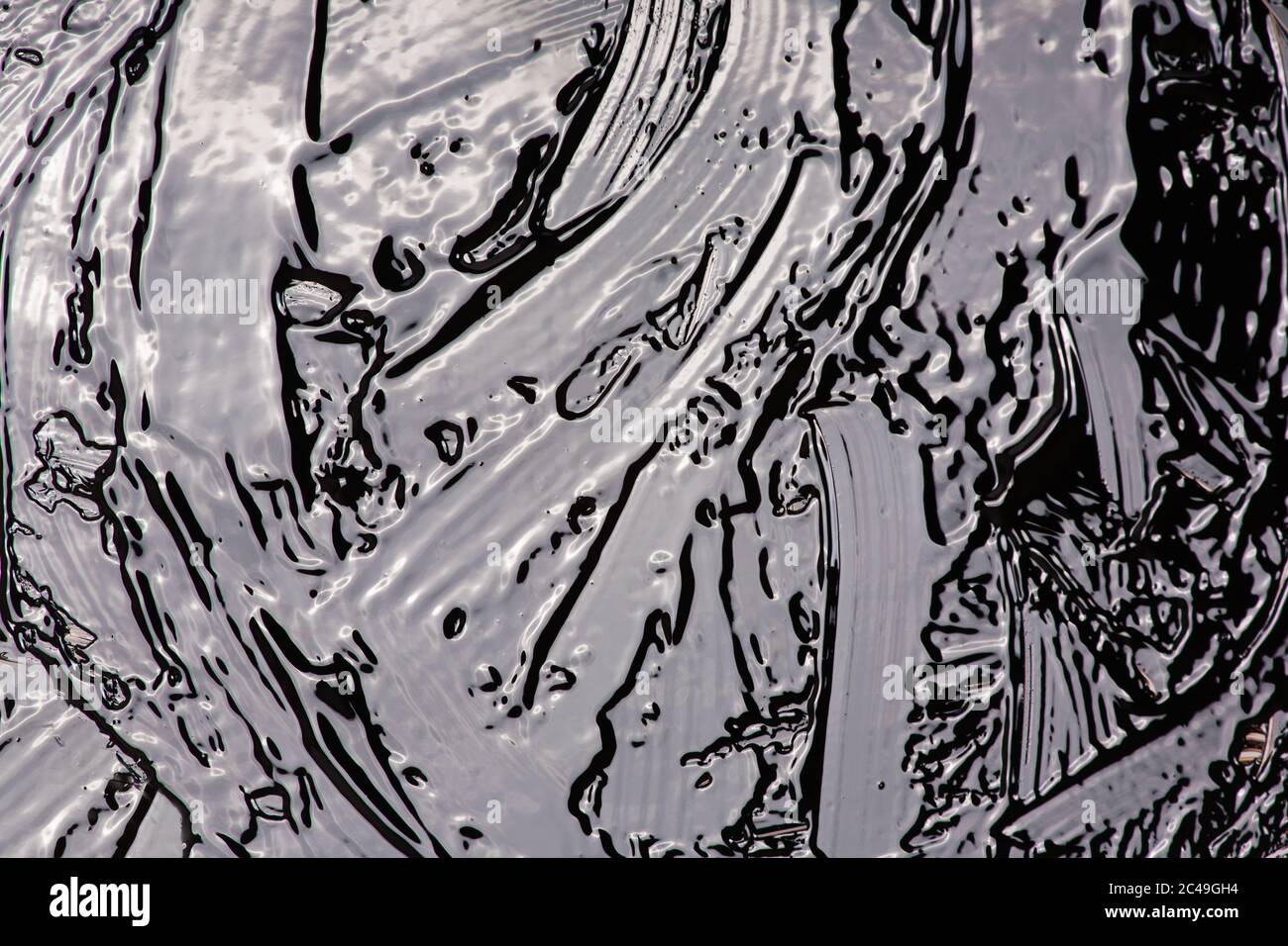 Liquid bitumen surface for backgrounds Stock Photo - Alamy
