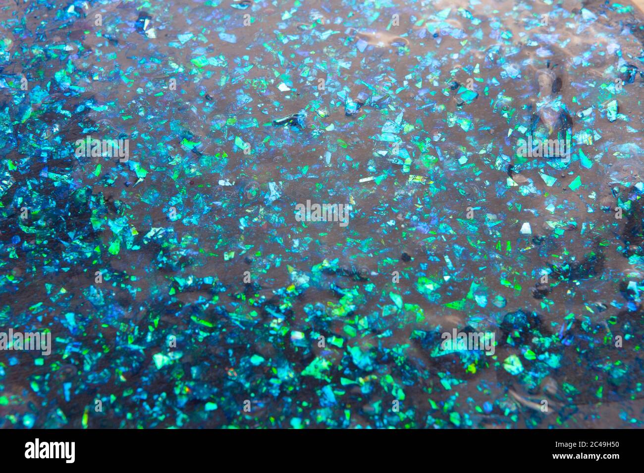 Blue and green glitter slime surface for backgrounds Stock Photo - Alamy