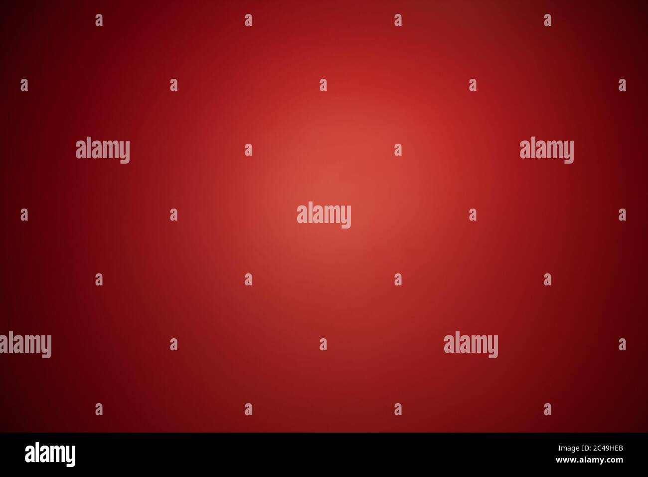 Abstract red spotlight background with dark vignettes. Bright and vivid ...