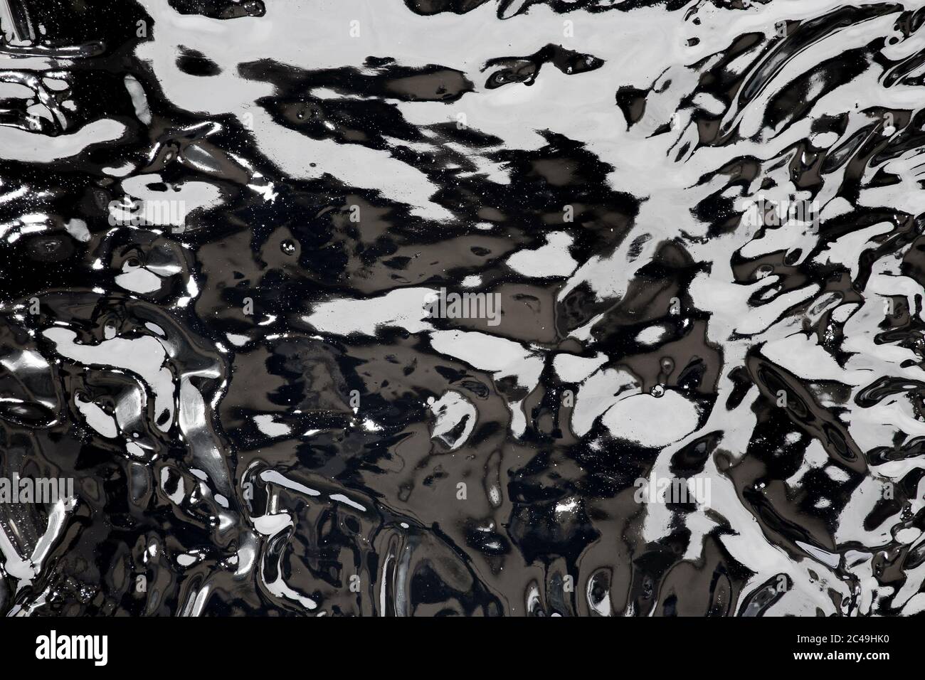 Surface of liquid tar for abstract backgrounds Stock Photo - Alamy