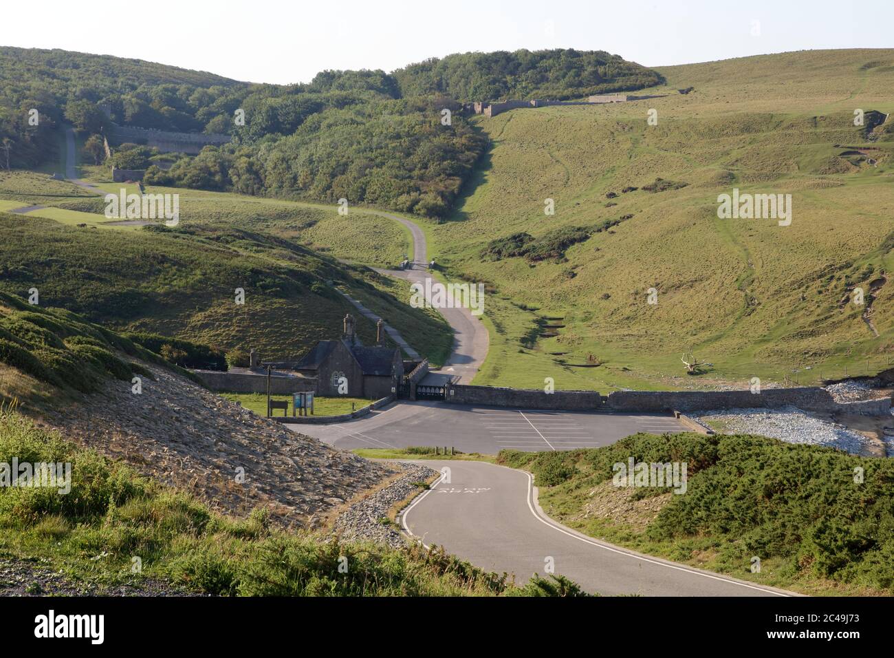 A long view of the old Dunraven castle ruins and walled garden on the ...