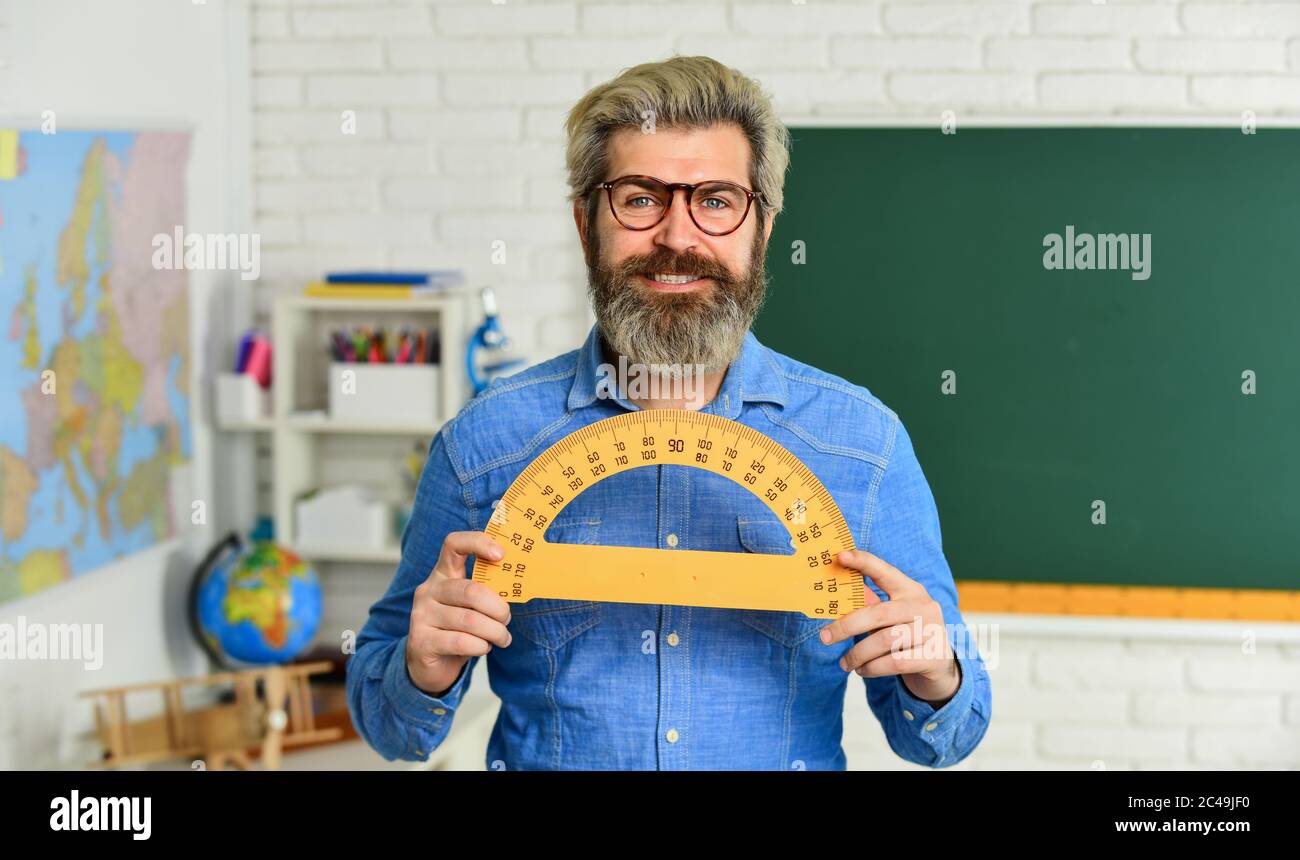 Math subject. Study mathematics. Mature bearded teacher in glasses ...