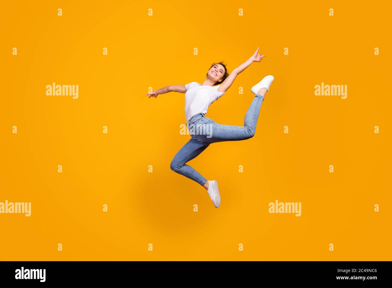 Full length profile photo of amazing lady flexible body raising leg ...