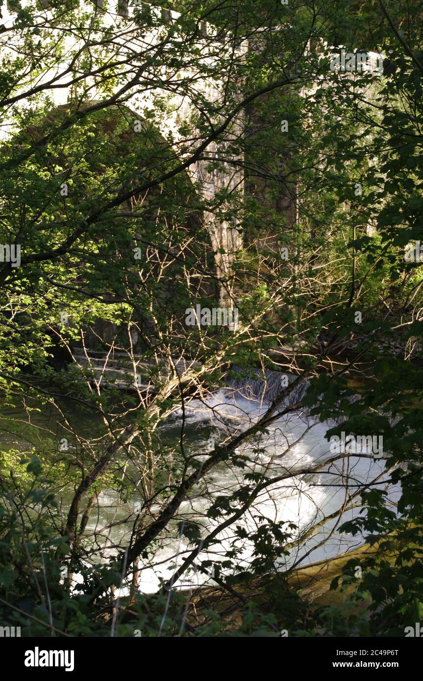 Vertical shot of a small round shaped waterfall Stock Photo - Alamy
