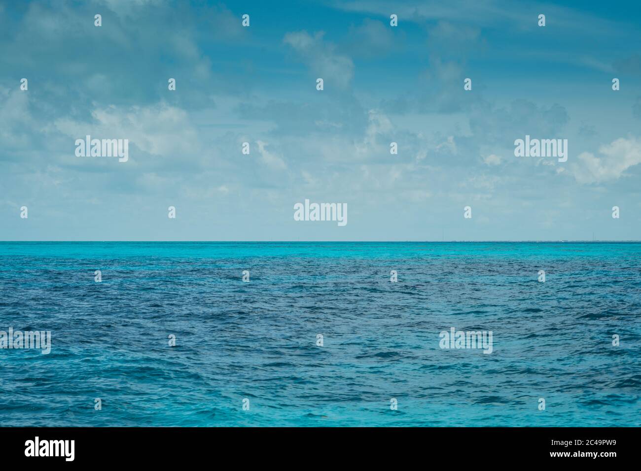 Azure blue Caribbean Sea at Florida Keys with clouds in the sky on a ...