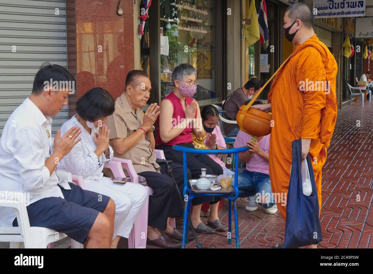 Buddhist monks on morning alms hi-res stock photography and images - Alamy