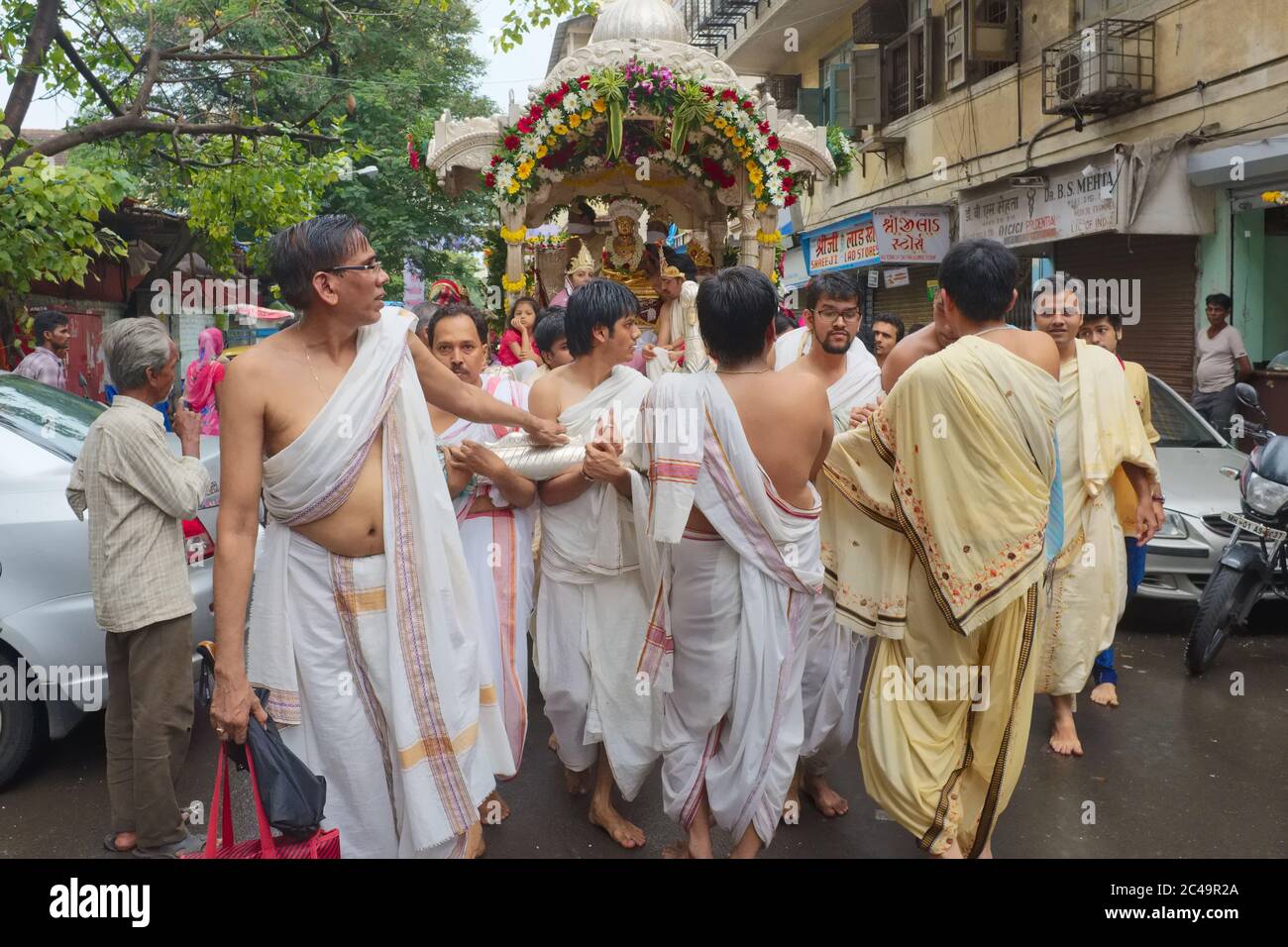 A procession of the Jain community in Mumbai, India, with a prominent ...