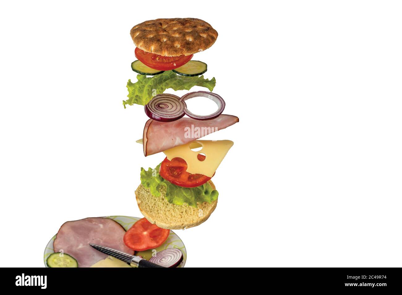 Close up view of homemade sandwich with flying ingredients isolated on ...