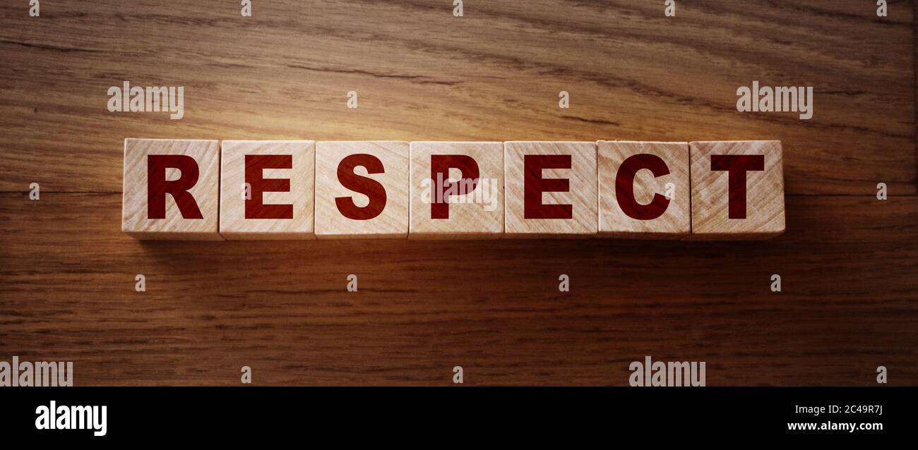 Respect word written on wood block. respect text on table, Business ...