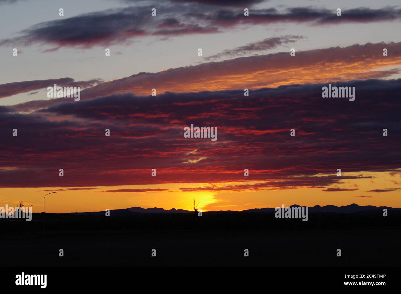 Magenta clouds at sunset over Silhouette horizon,Sequence of images of ...