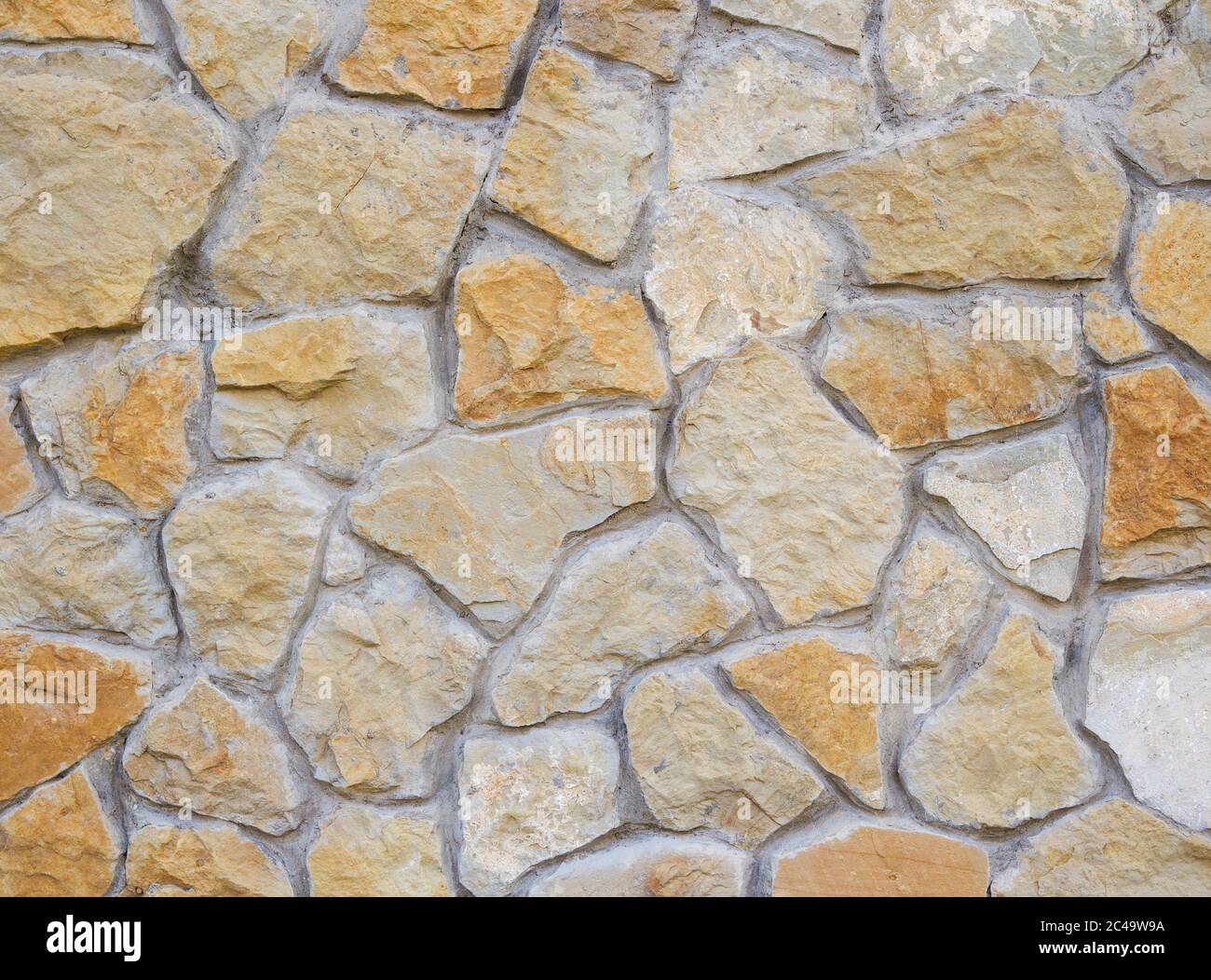 Yellow stone. Natural cobblestone, high detail background, stone ...