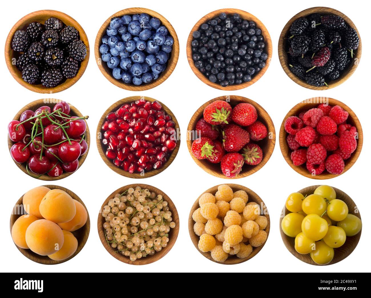 Black-blue, yellow and red berries isolated on white background ...