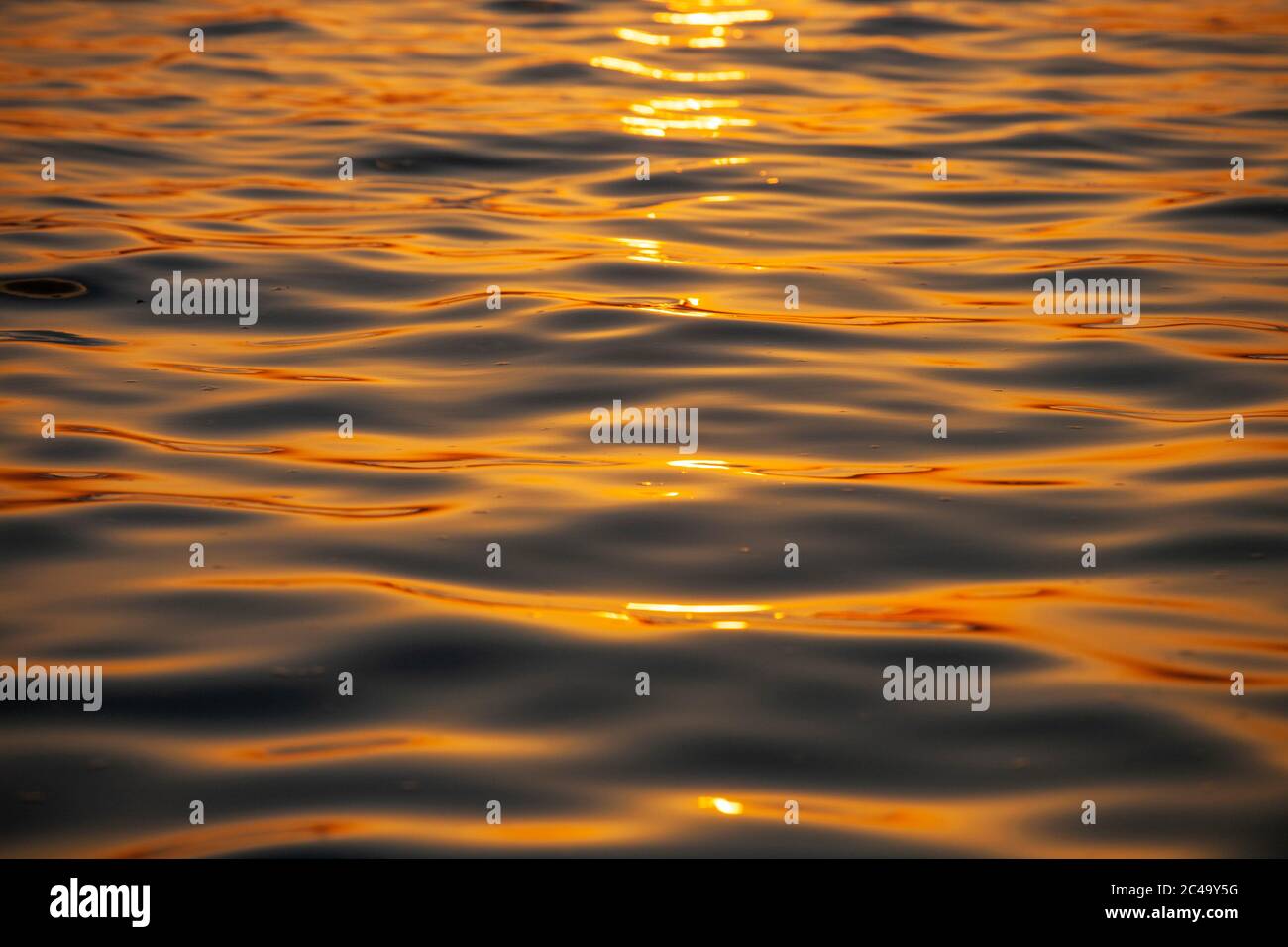 Golden color waves for abstract natural backgrounds Stock Photo - Alamy