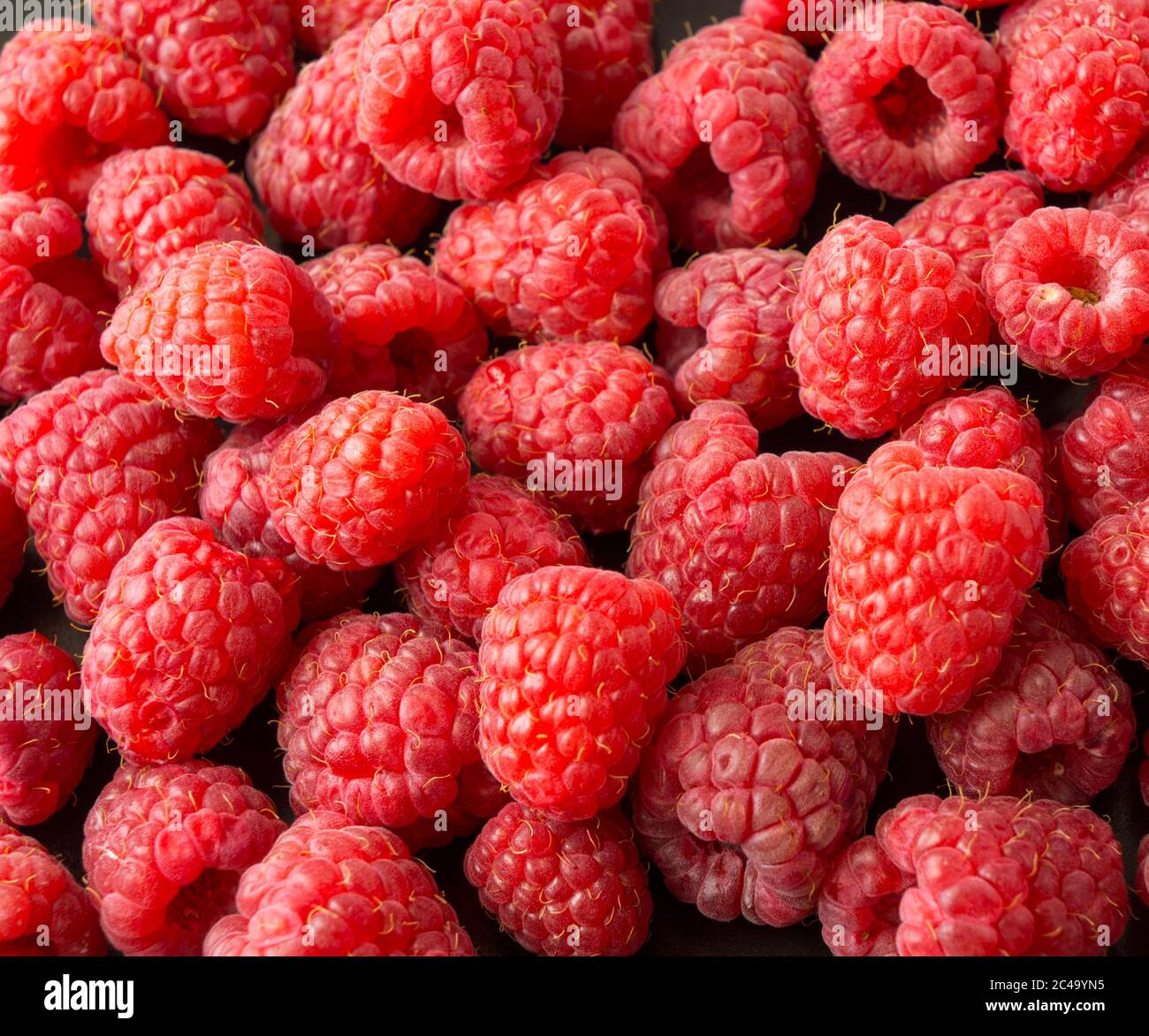Background of raspberries. Fresh raspberries closeup. Top view ...
