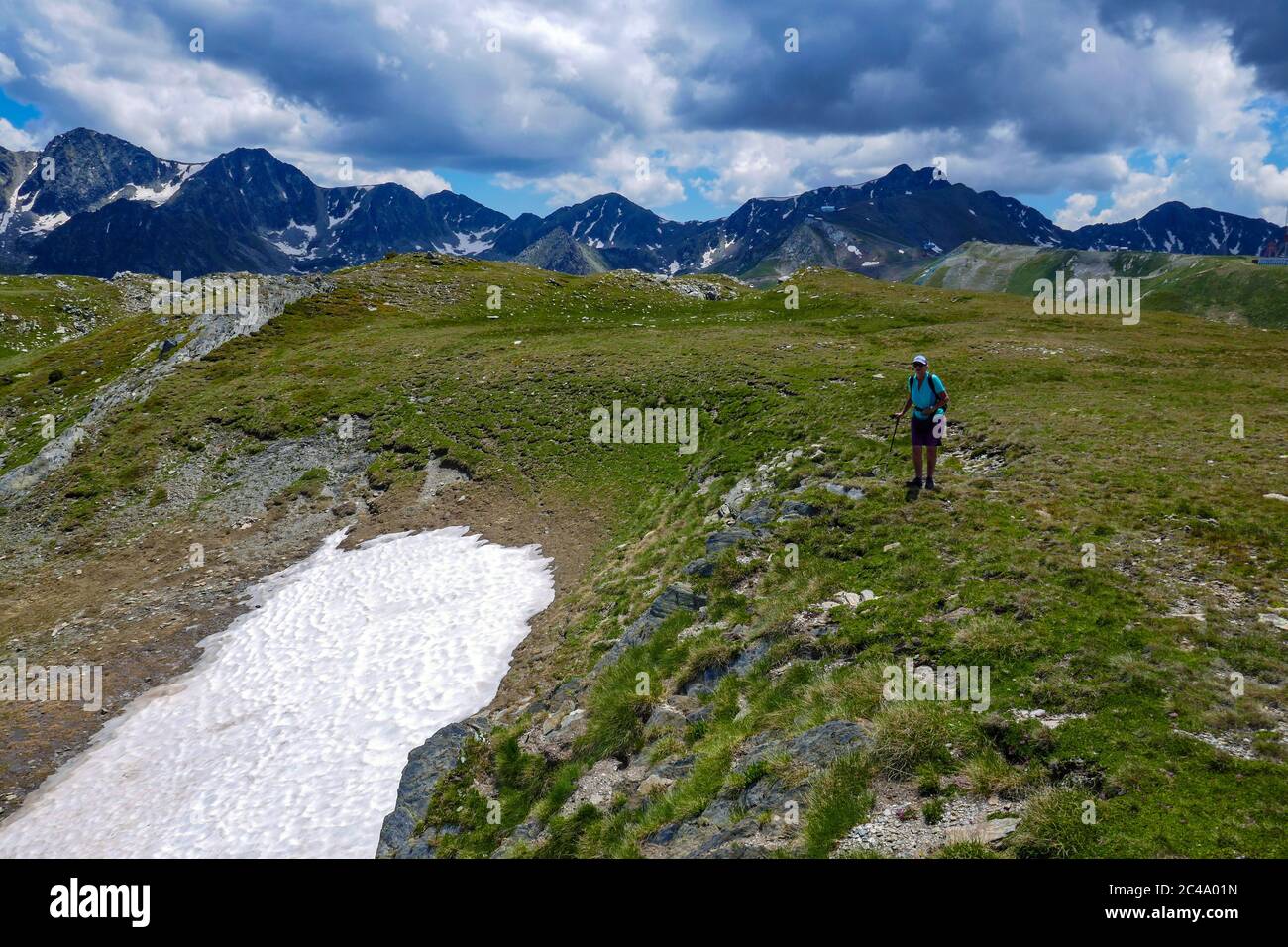 Solitary female walker, hiker, above Port d'Envalera pass, Pas de la ...