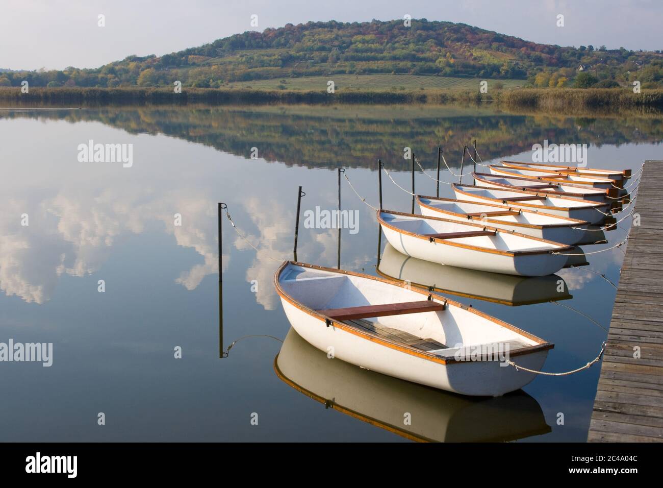 white boats at a boat harbor Stock Photo - Alamy
