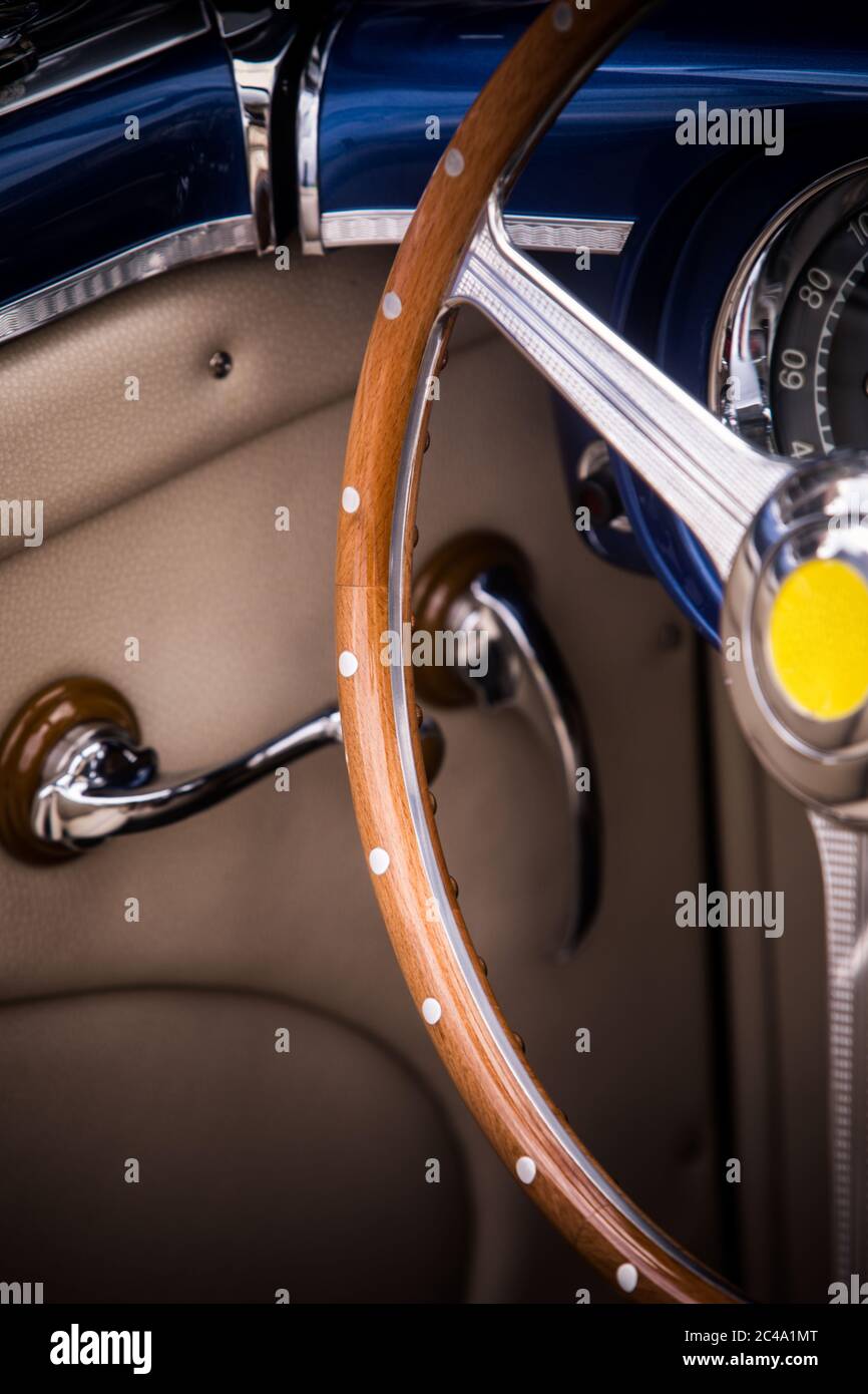 Color close up of the wooden steering wheel of an old classic car Stock ...
