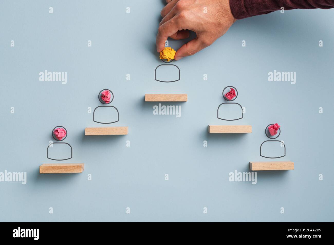 Leadership and human resources conceptual image - male hand structuring ...