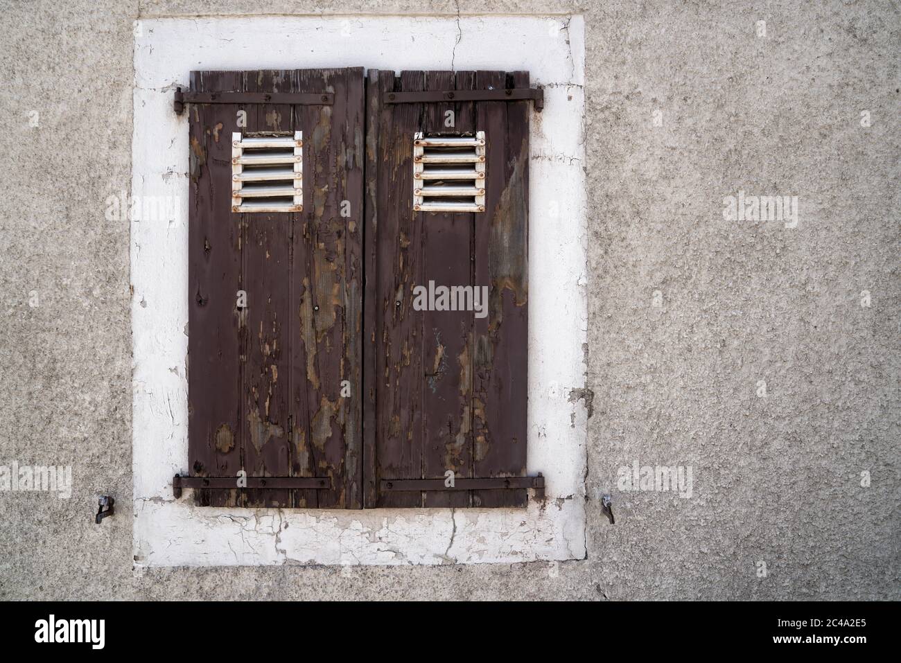 An old weather-worn window shutter in Sainte-Croix, Switzerland Stock ...