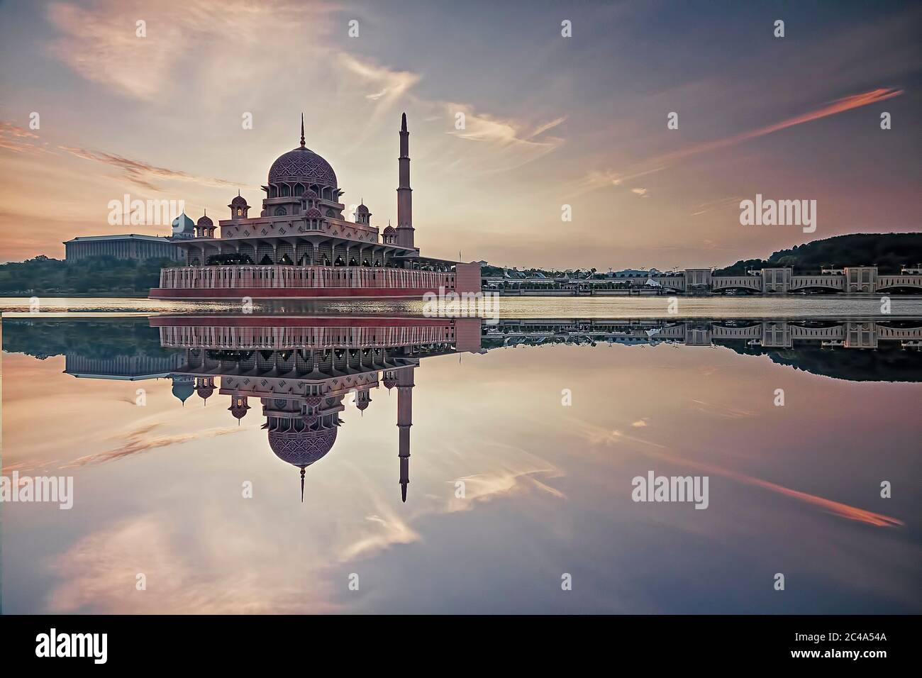 Beautiful architectural design of Putra Mosque captured during sunrise ...