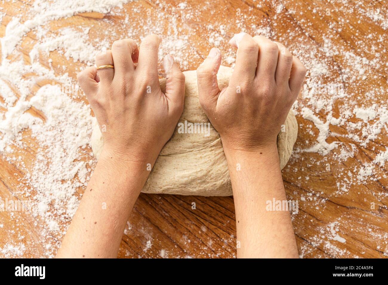 Woman working dough making homemade hi-res stock photography and images ...