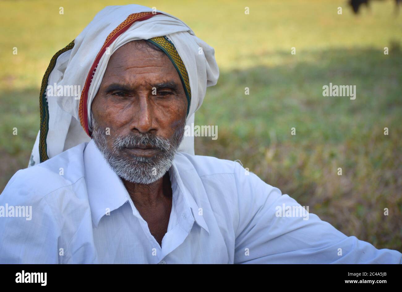Indian rural old man sitting hi-res stock photography and images - Alamy