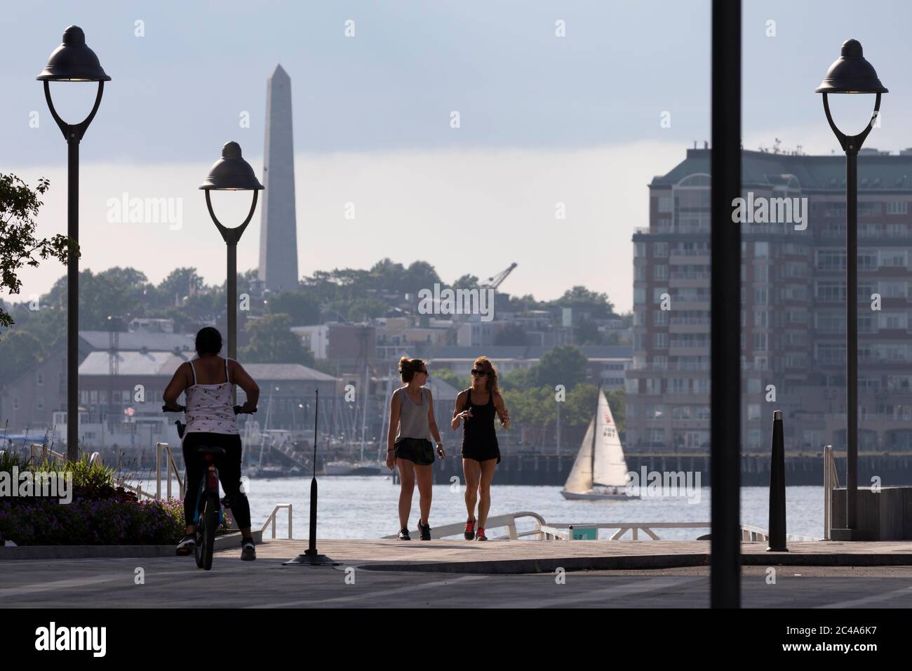 People strolling on the East Boston waterfront Stock Photo - Alamy