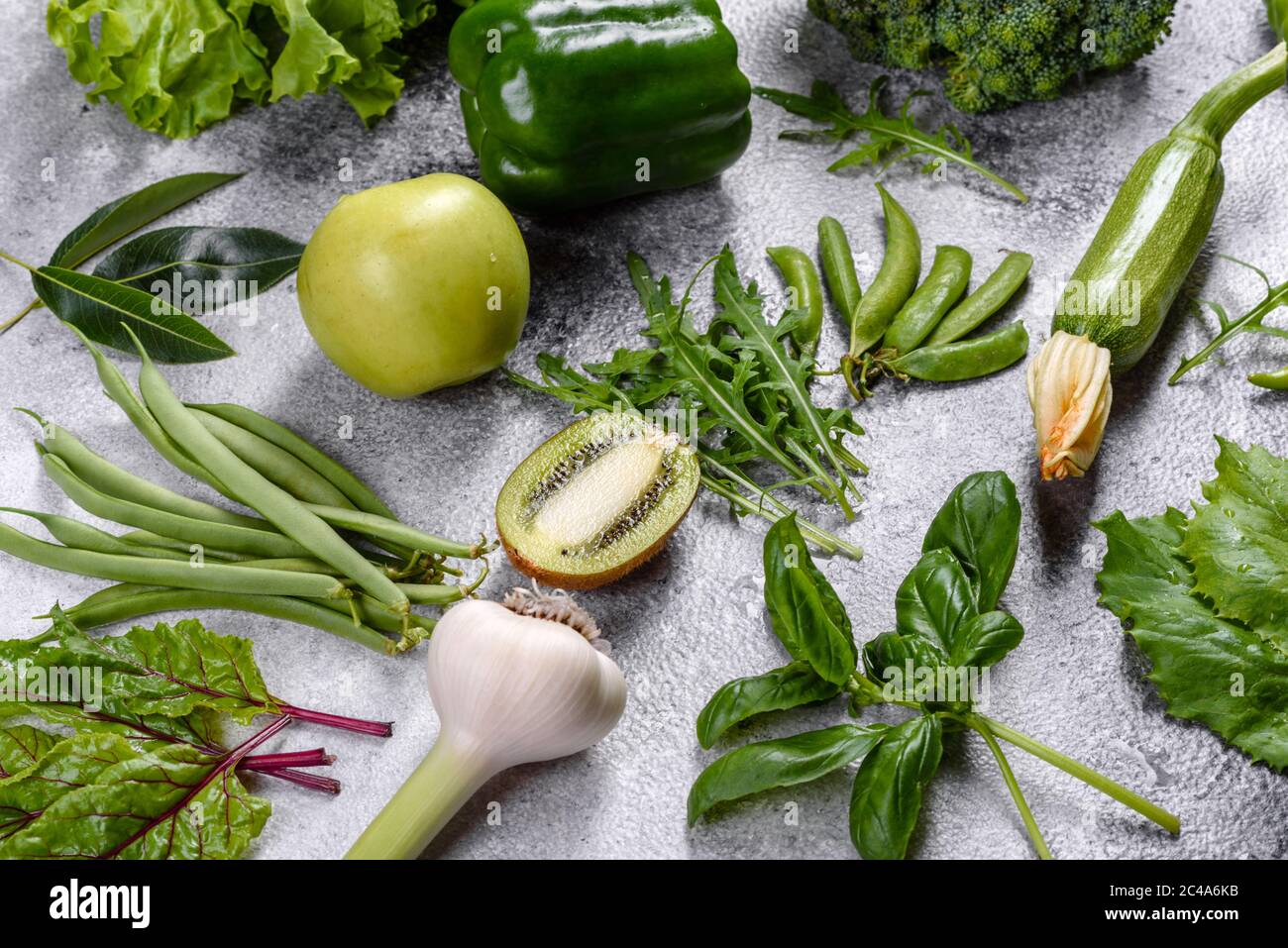 Flat lay series of assorted green toned vegetables, fresh organic raw ...