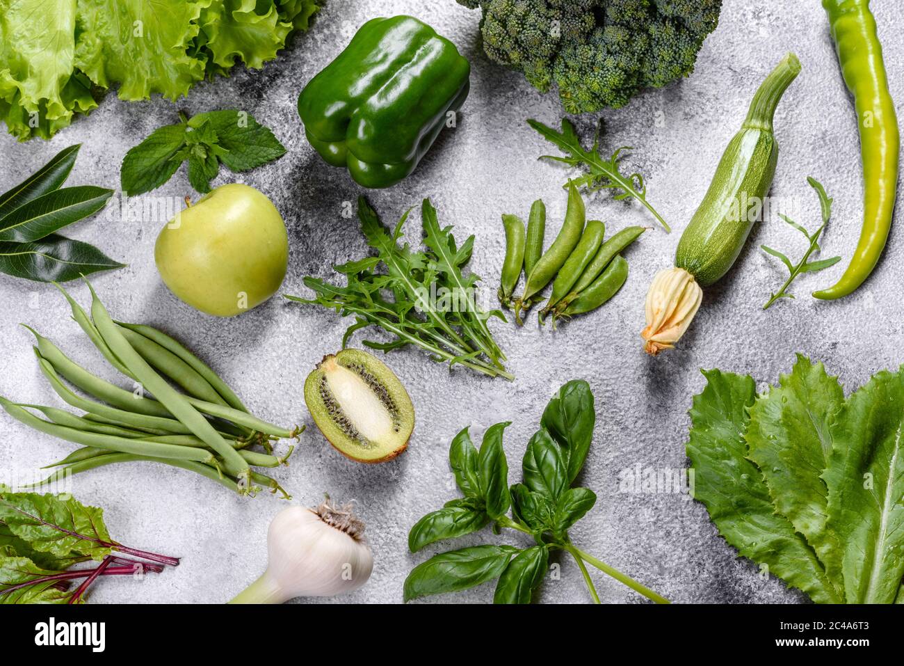 Flat lay series of assorted green toned vegetables, fresh organic raw ...