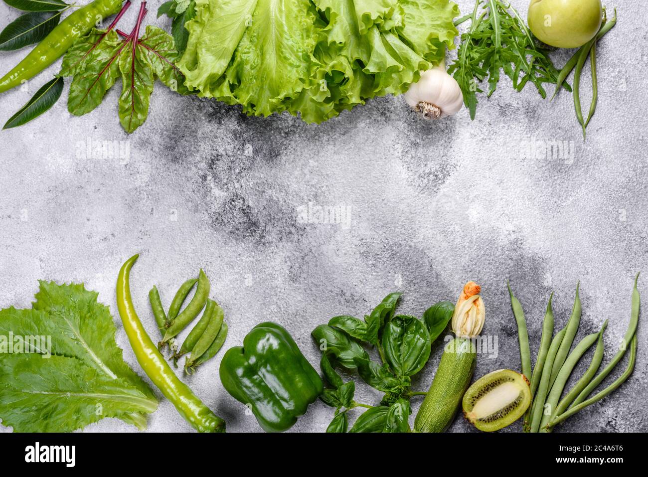 Flat lay series of assorted green toned vegetables, fresh organic raw ...