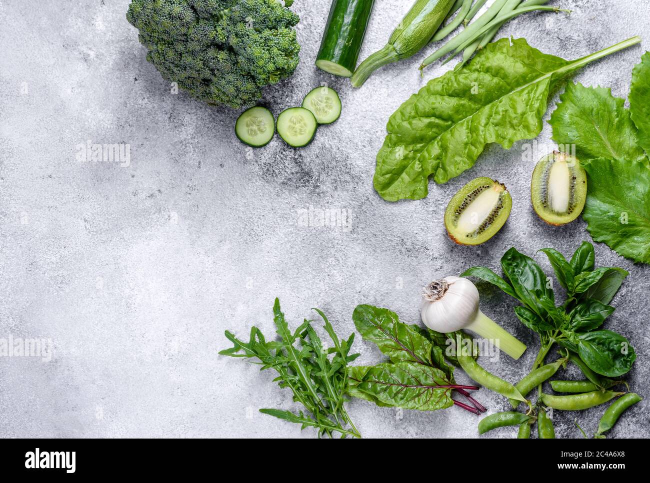 Flat lay series of assorted green toned vegetables, fresh organic raw ...